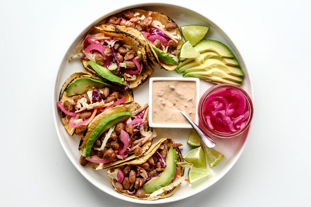 Smashed Pinto Bean Tacos with Pickled Red Onions & Smoky Chipotle Crema ...